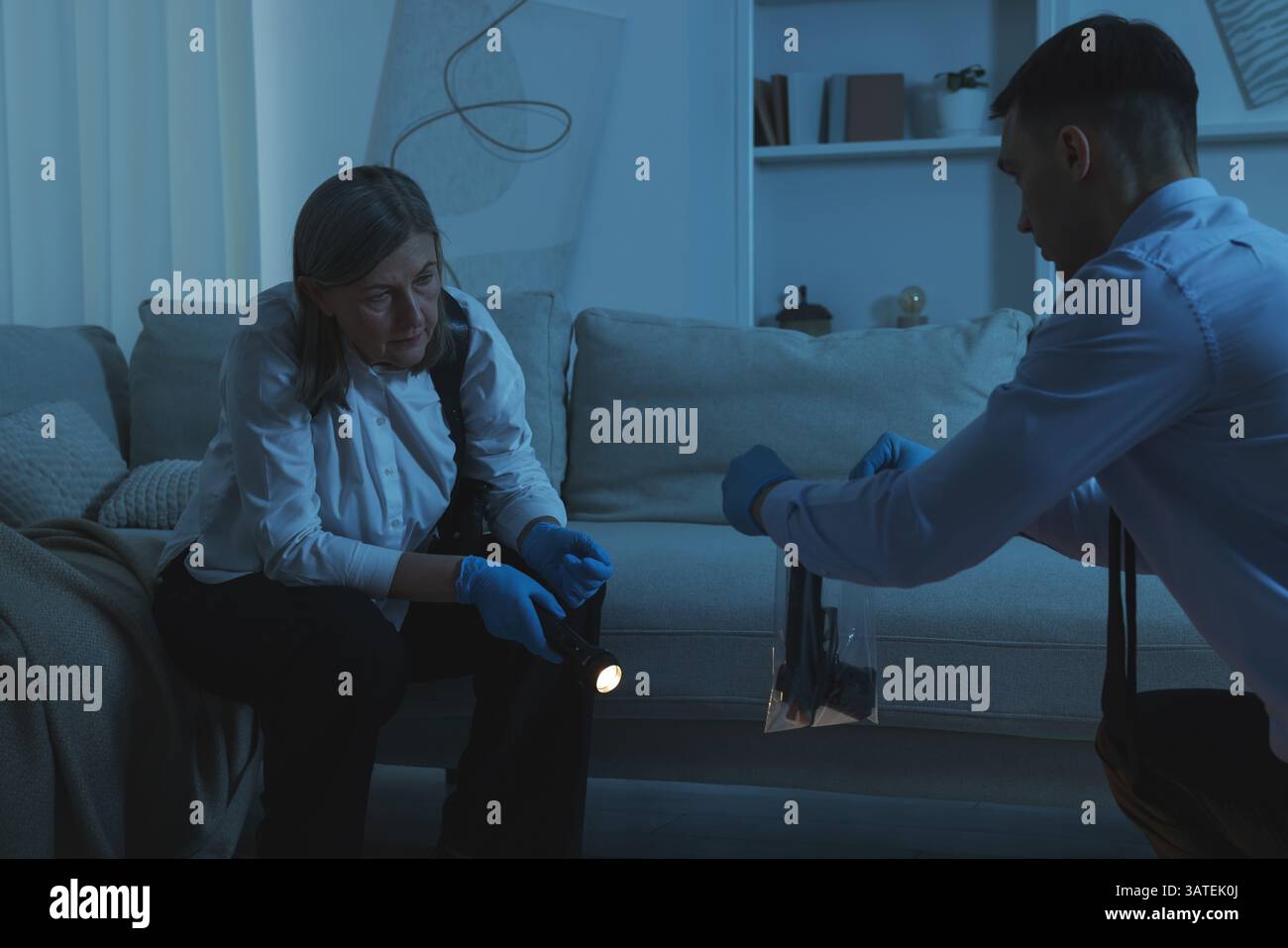Forensic experts working at crime scene indoors Stock Photo - Alamy