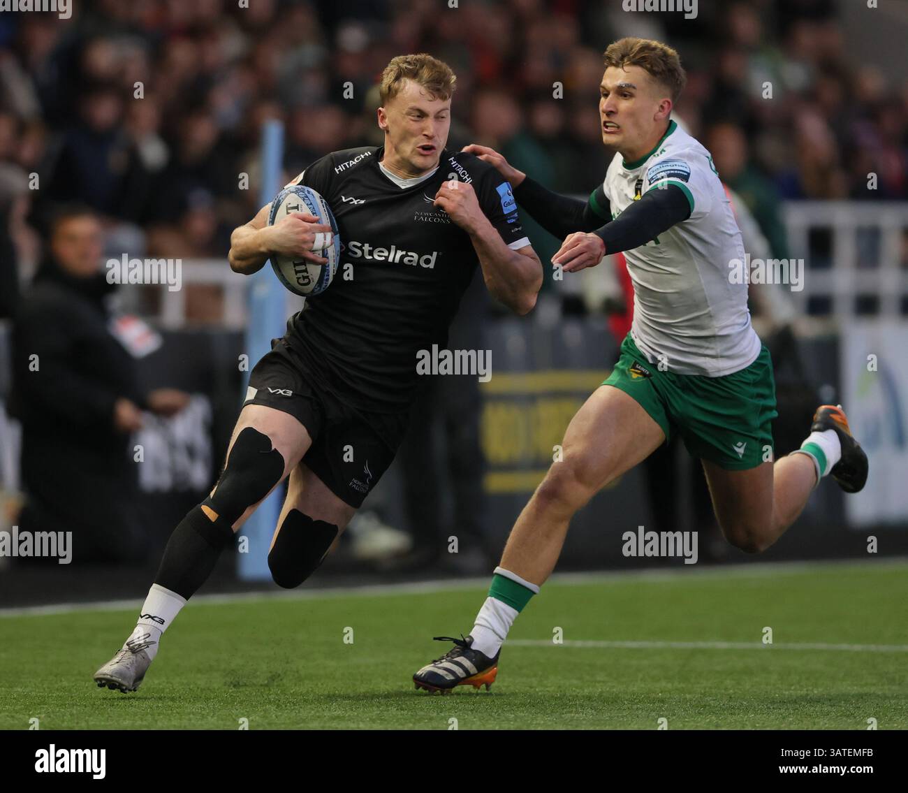 Newcastle Falcons’ Alex Hearle (left) and Northampton Saints’ Will ...