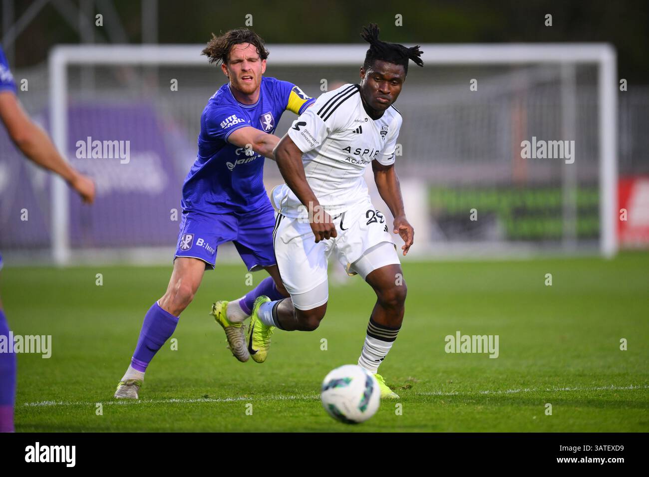 Maasmechelen, Belgium. 18th Apr, 2025. Patro Eisden's Jordan Renson and ...