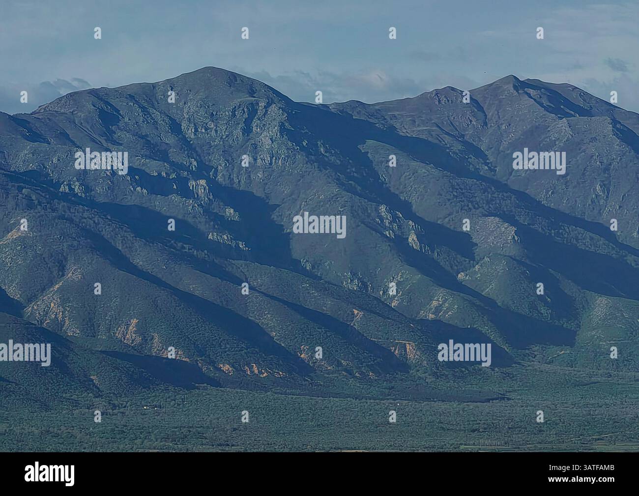 Contours of Elevation: Sunny Mountain Layers Stock Photo - Alamy