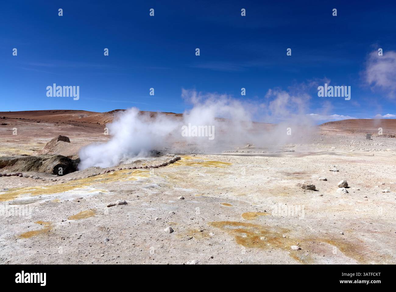 Active geothermal field with steam vents and yellow sulfur deposits in ...