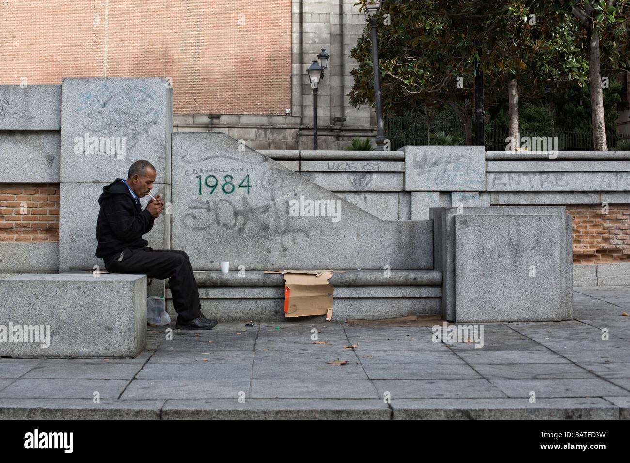 October 23, 2013 - Madrid, Spain - Man smoking a cigarette with a 1984 ...