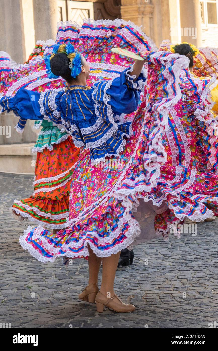 Colorful clothes of traditional Mexican folklore dancers in motion ...
