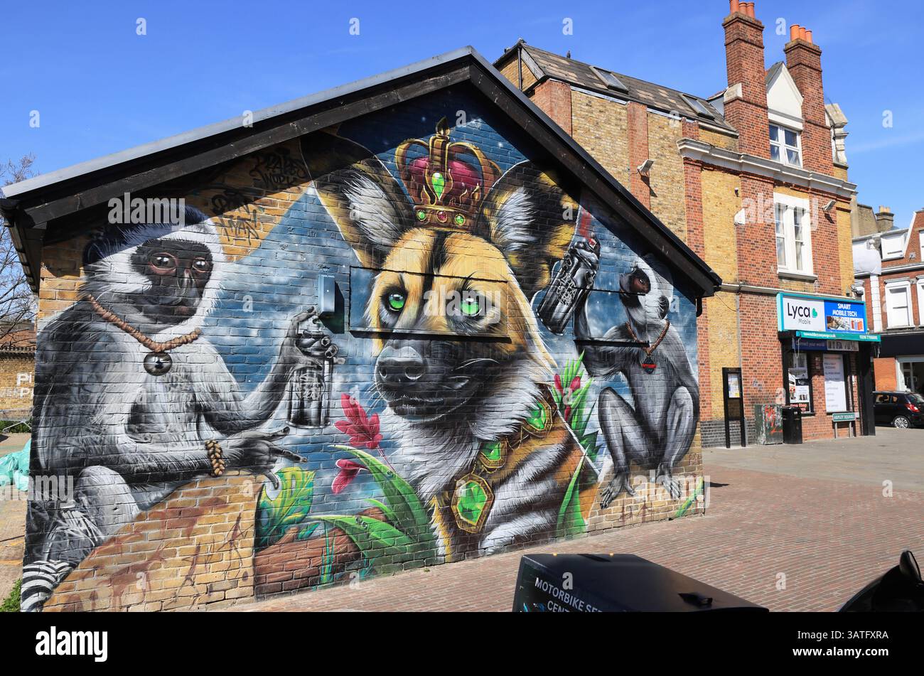 Colourful street art on buildings on Penge High Street SE20, London, UK ...