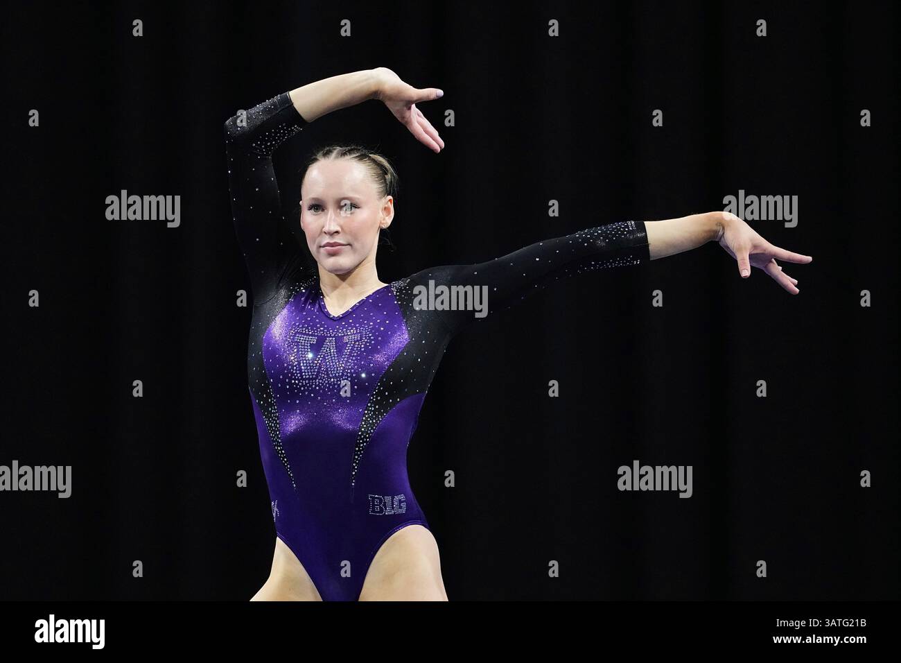 Washington's Mary McDonough competes on the balance beam during the ...