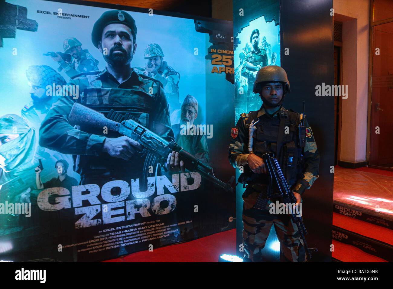 An Indian Border Security Force (BSF) soldier stands guard during the ...