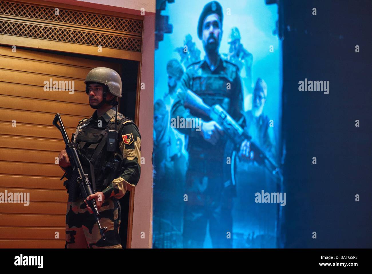 An Indian Border Security Force (BSF) soldier stands guard during the ...