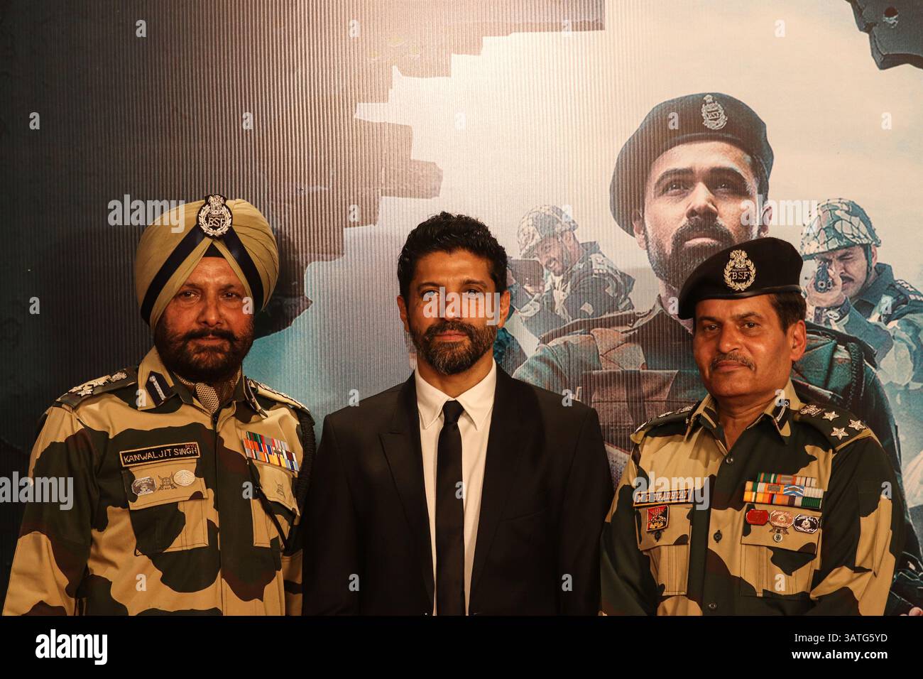 Indian Bollywood actor Farhan Akhtar (center) poses for a picture with ...