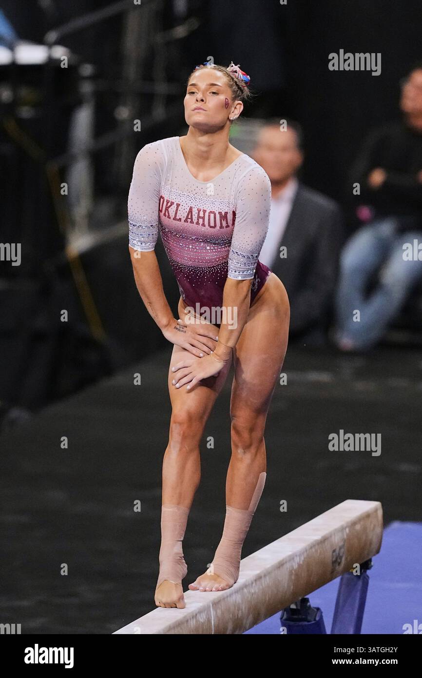 Oklahoma's Jordan Bowers competes on the balance beam during the NCAA ...
