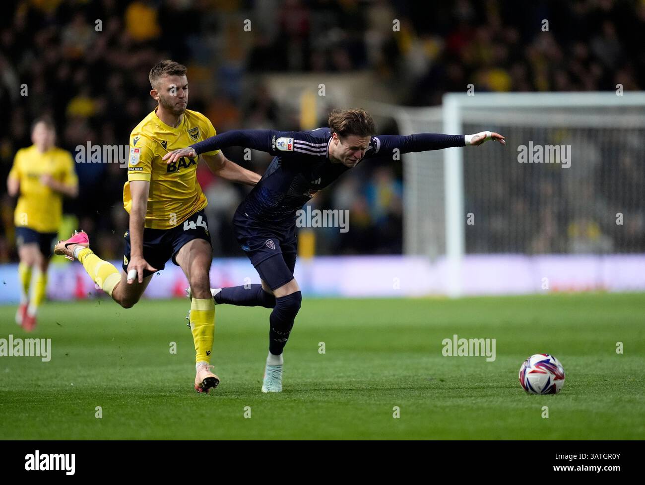 Leeds United's Joe Rodon (right) is fouled by Oxford United's Stanley ...