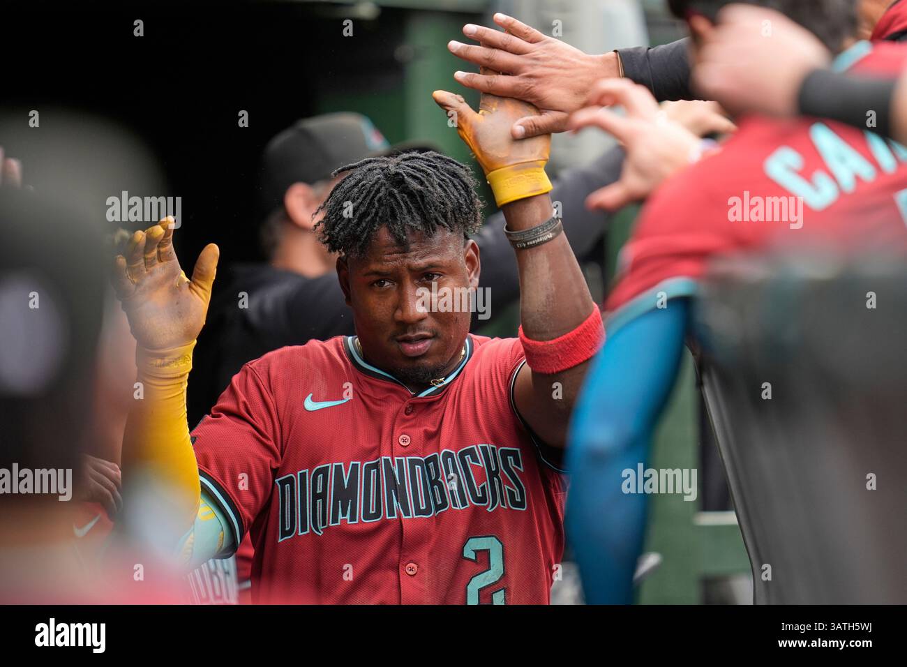 Arizona Diamondbacks' Geraldo Perdomo celebrates after scoring on a ...