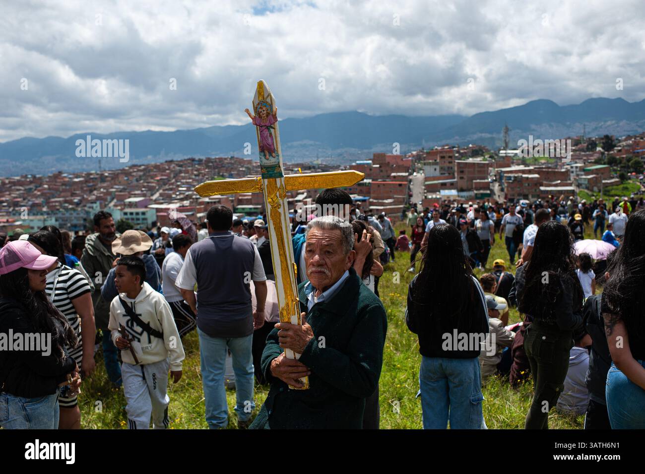 Bogota, Colombia. 18th Apr, 2025. People carry crosses during the Good ...