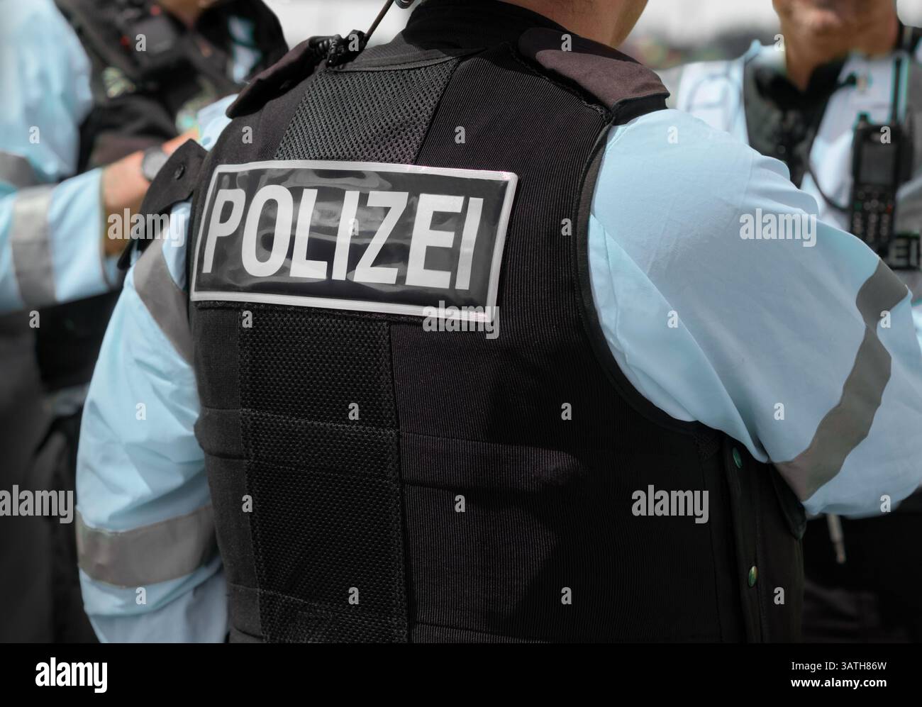 Police - Close-up of POLIZEI marking on the back of a hi-visibility ...