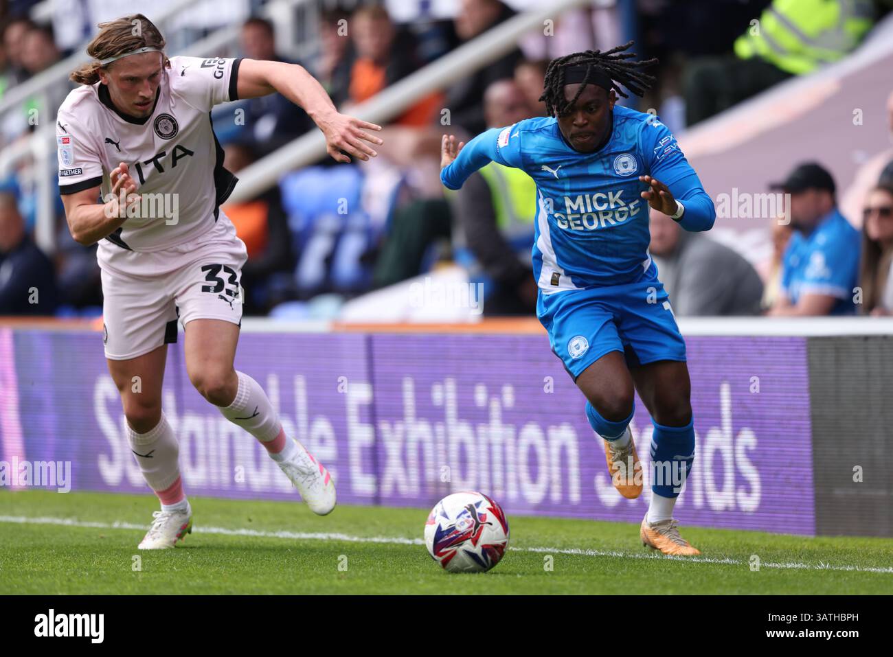 Brad Hills (SC) Abraham Odoh (PU) at the Peterborough United v ...