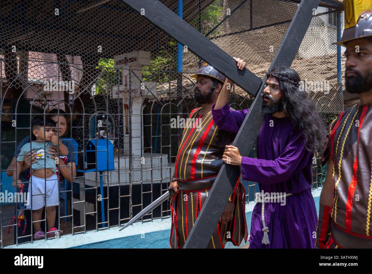 MUMBAI, INDIA - APRIL 18: People reenact the crucifixion of Jesus ...