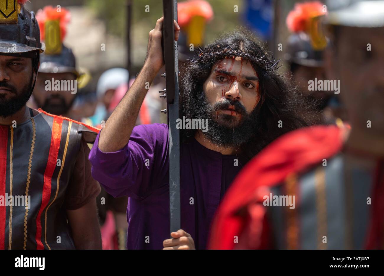 MUMBAI, INDIA - APRIL 18: People reenact the crucifixion of Jesus ...