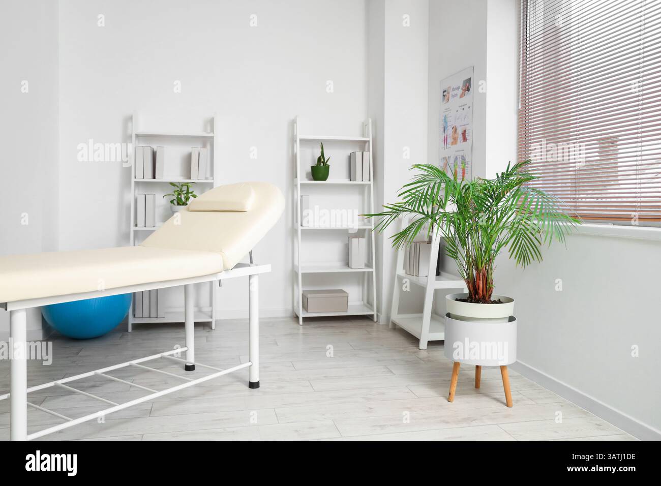 Interior of rehabilitation center with couch and shelf units Stock ...