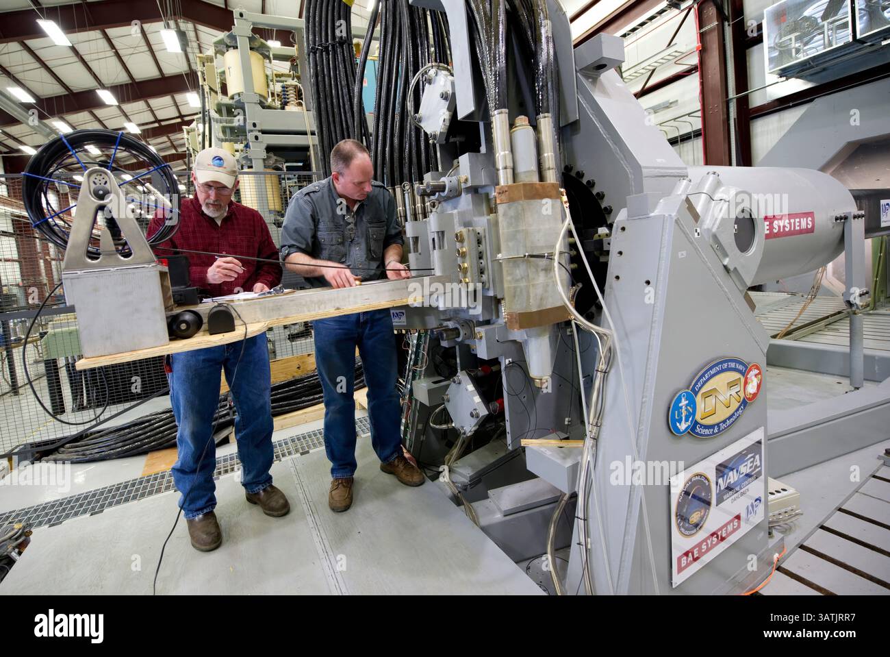 Gary Bass, left, and Jim Poyner, from the Naval Surface Warfare Center ...
