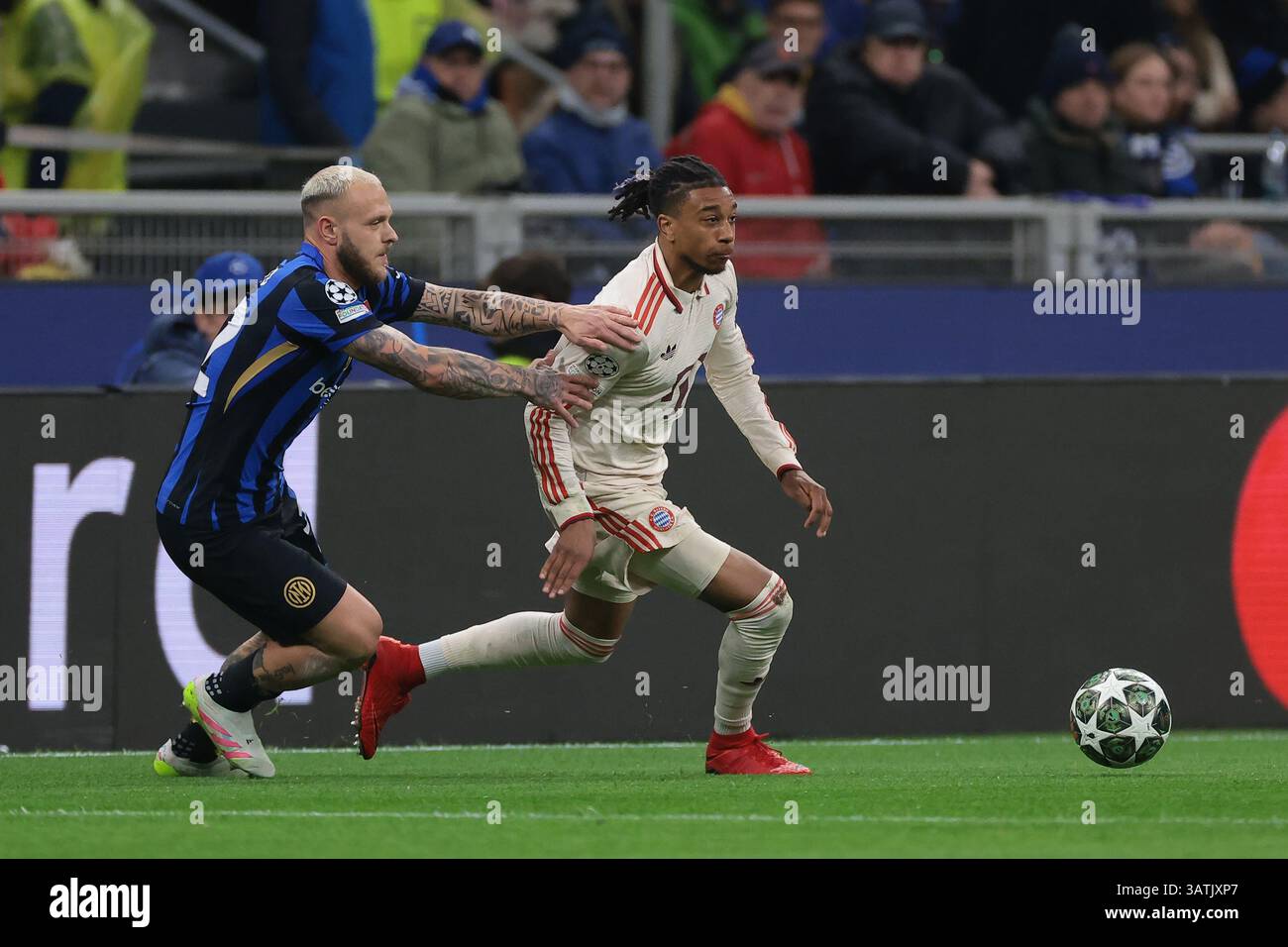 Milan, Italy. 16th Apr, 2025. Federico Dimarco of FC Internazionale tugs on the shoulder of ...