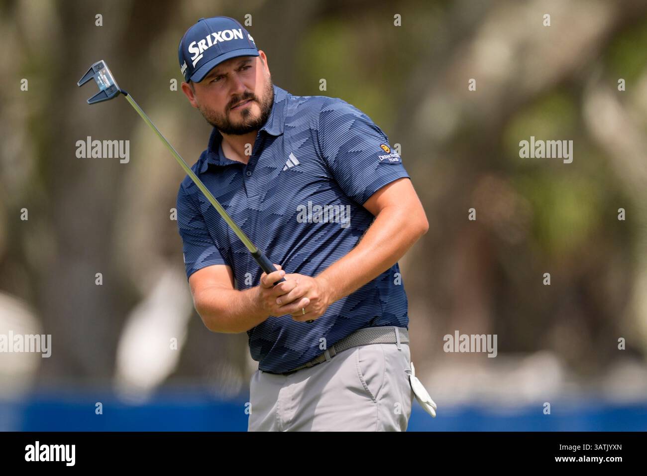 Andrew Novak watches his ball on the 17th green during the second round ...