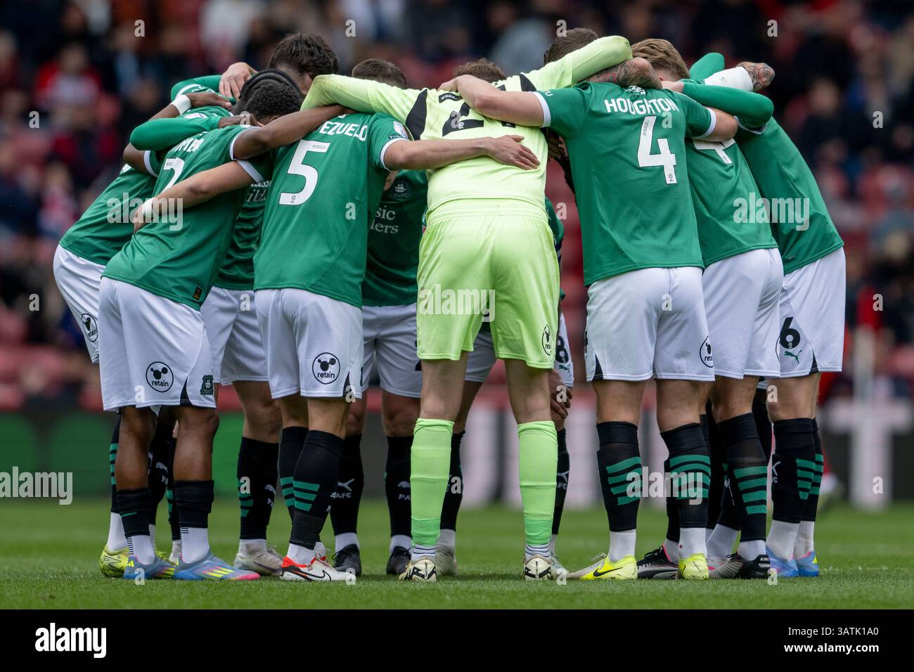 Plymouth Argyle's team huddle prior to kick off during the Sky Bet Championship match between ...