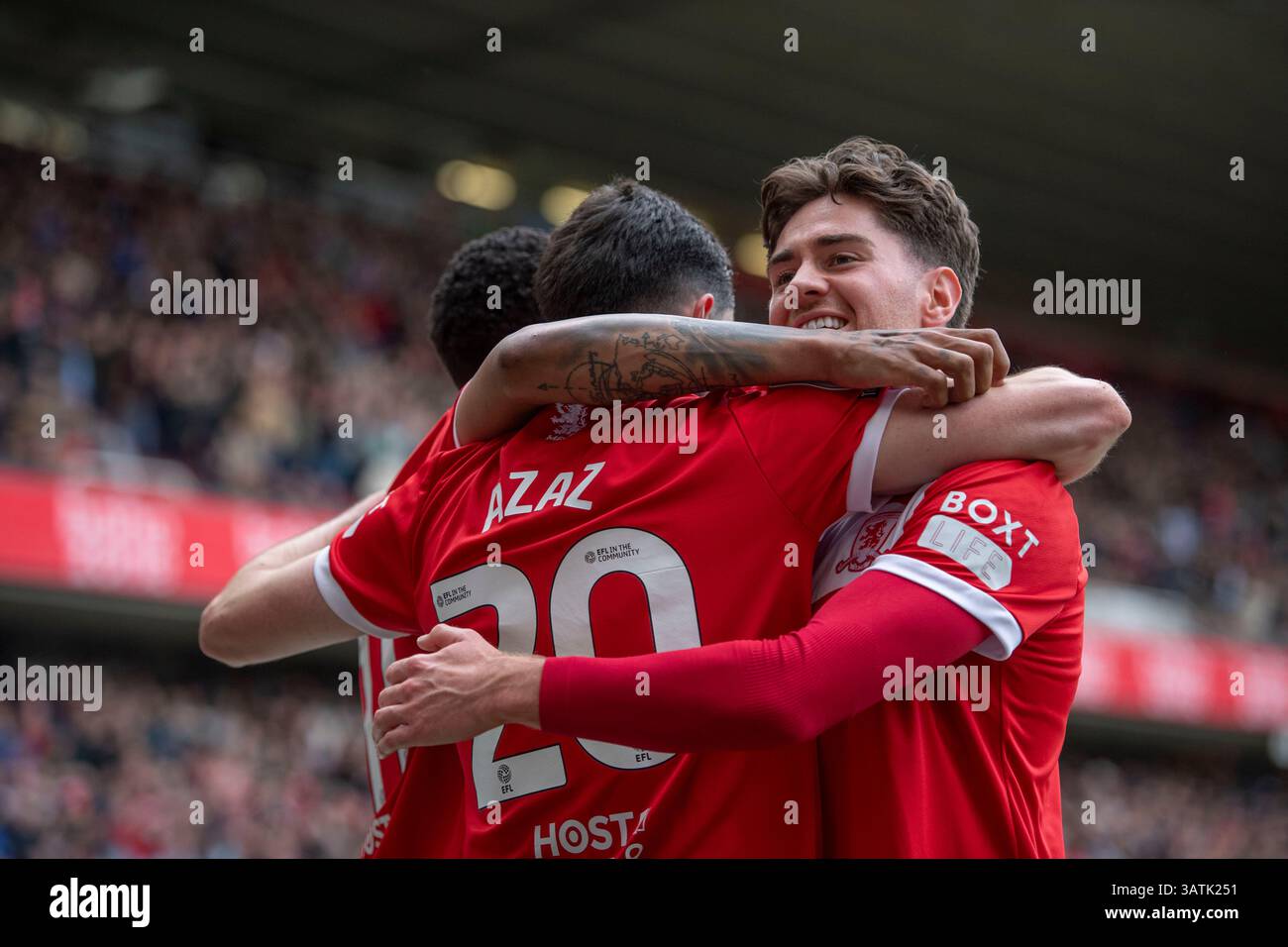 Middlesbrough's Hayden Hackney congratulates team mate Finn Azaz after ...