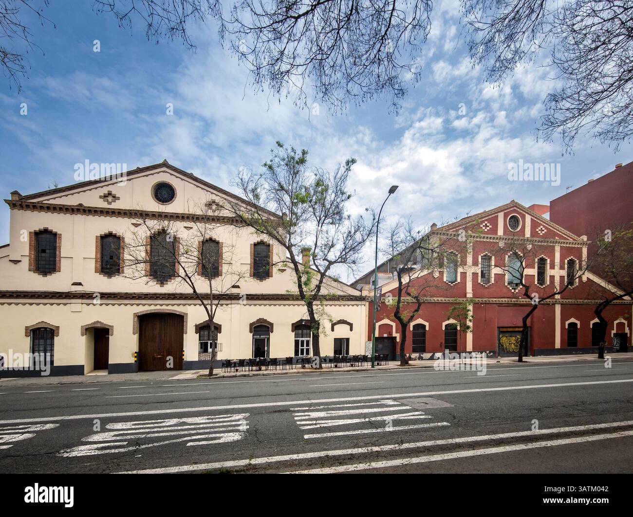 Industrial buildings along Seville's historic ring road showcase unique ...