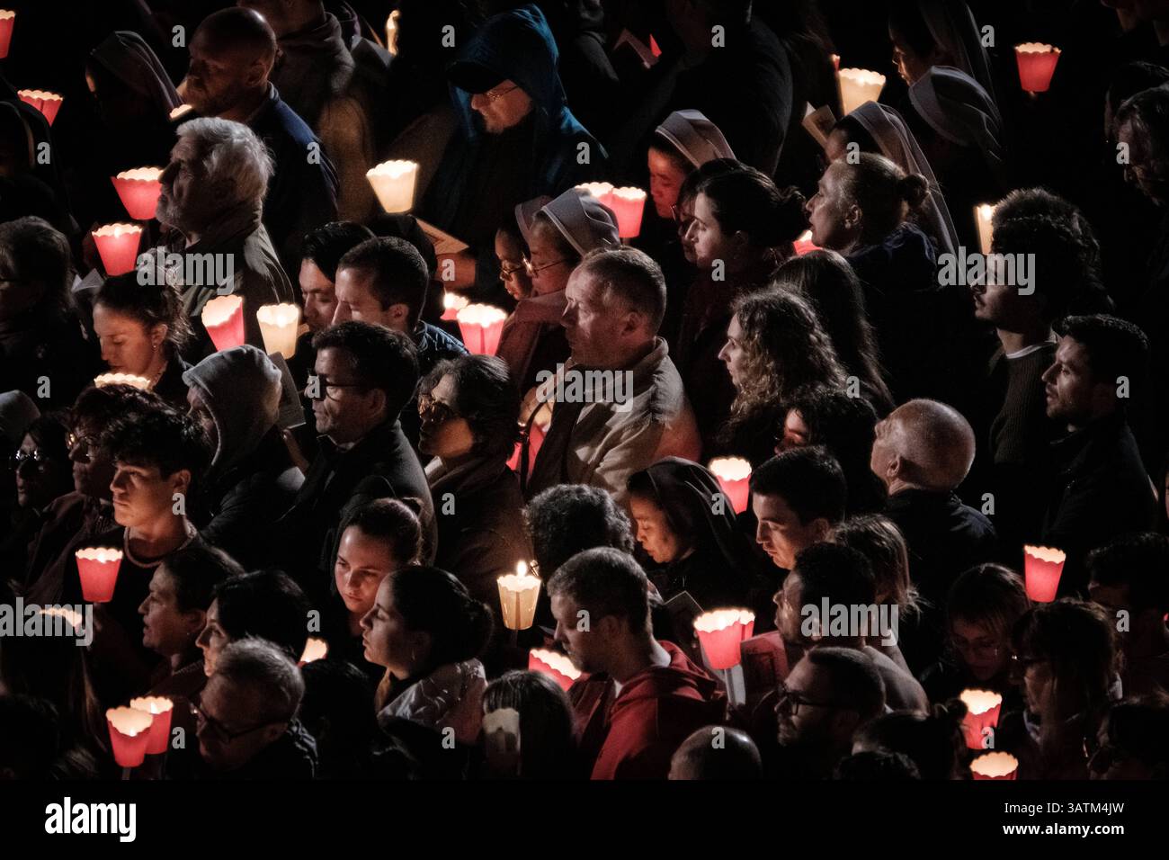 Rome, Via Crucis. Faithful attend the celebration. On Good Friday ...