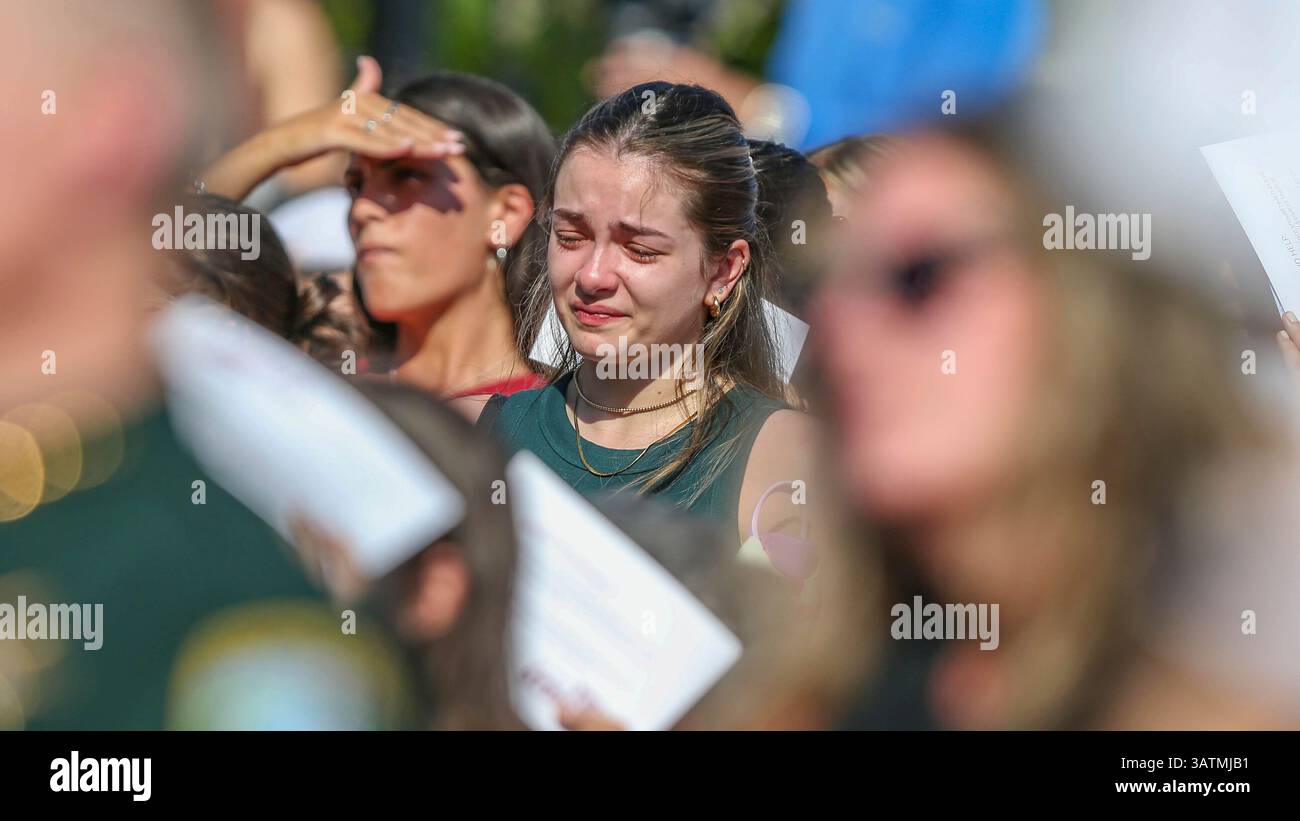 A student mourns during a vigil on the Florida State campus at Langford ...
