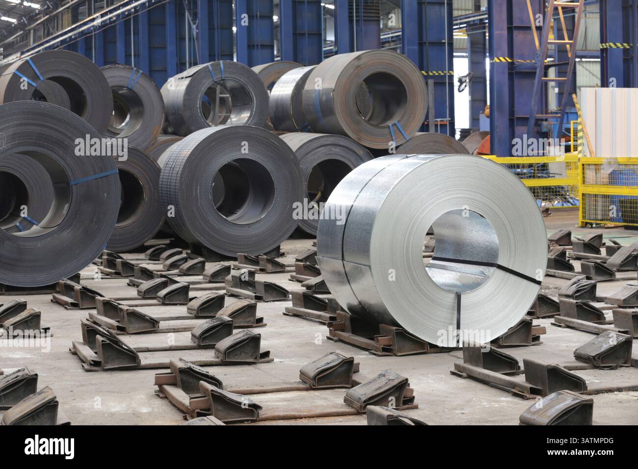 Roll of steel sheet in a plant. Rolls of sheet steel of Factory. Coils ...
