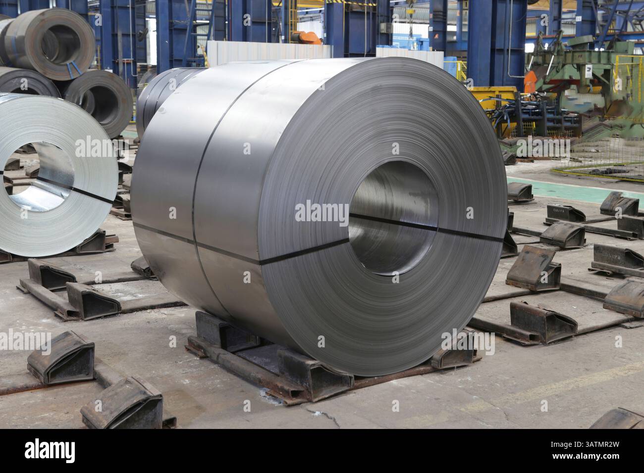 Roll of steel sheet in a plant. Rolls of sheet steel of Factory. Coils ...