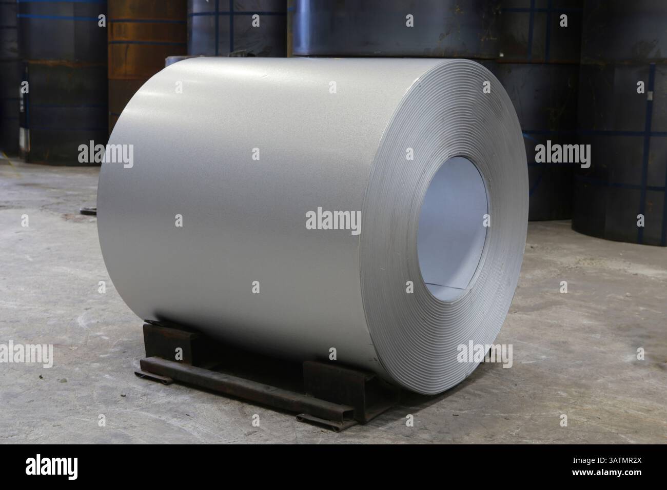 Roll of steel sheet in a plant. Rolls of sheet steel of Factory. Coils ...