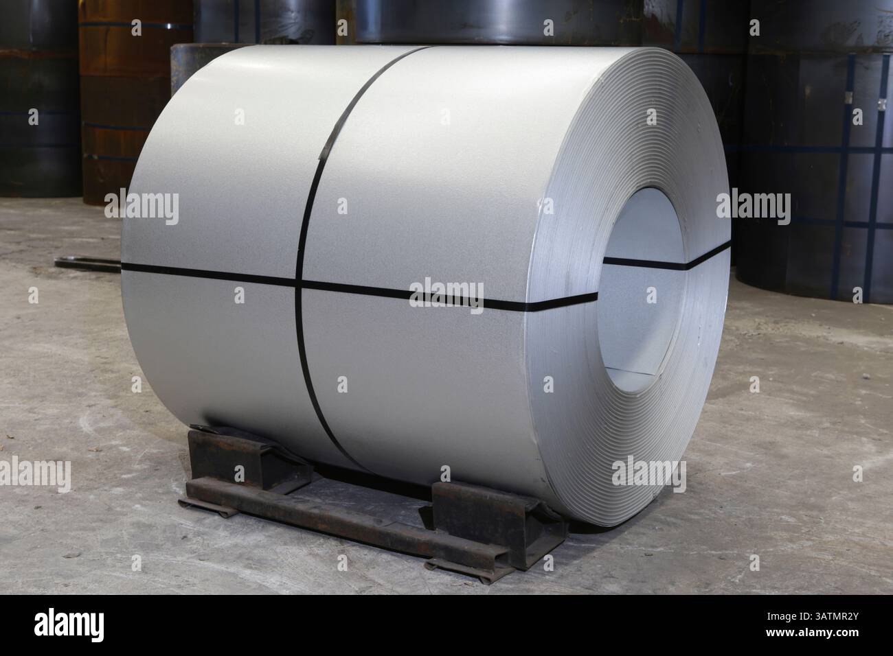 Roll of steel sheet in a plant. Rolls of sheet steel of Factory. Coils ...