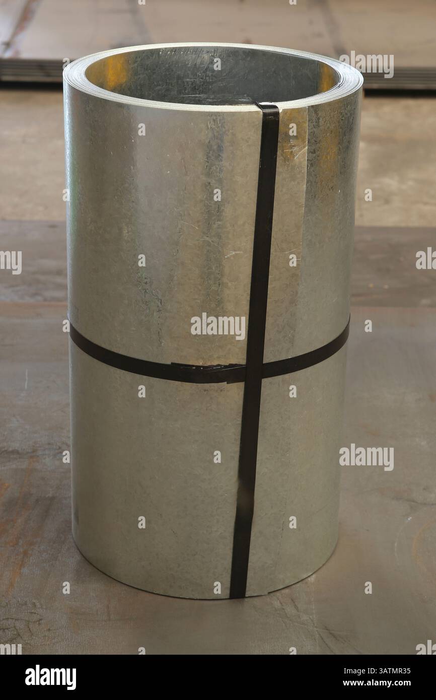 Roll of steel sheet in a plant. Rolls of sheet steel of Factory. Coils ...