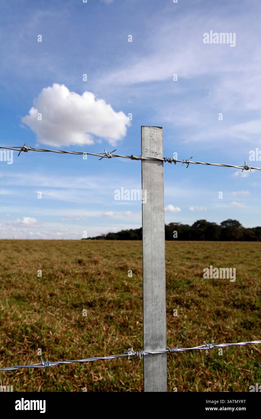 new steel fence in farm with blue sky and clouds in background on ...