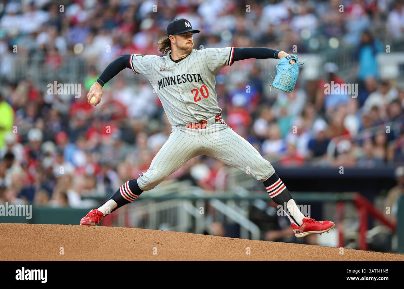 Minnesota Twins pitcher Chris Paddack (20) delivers in the first inning ...