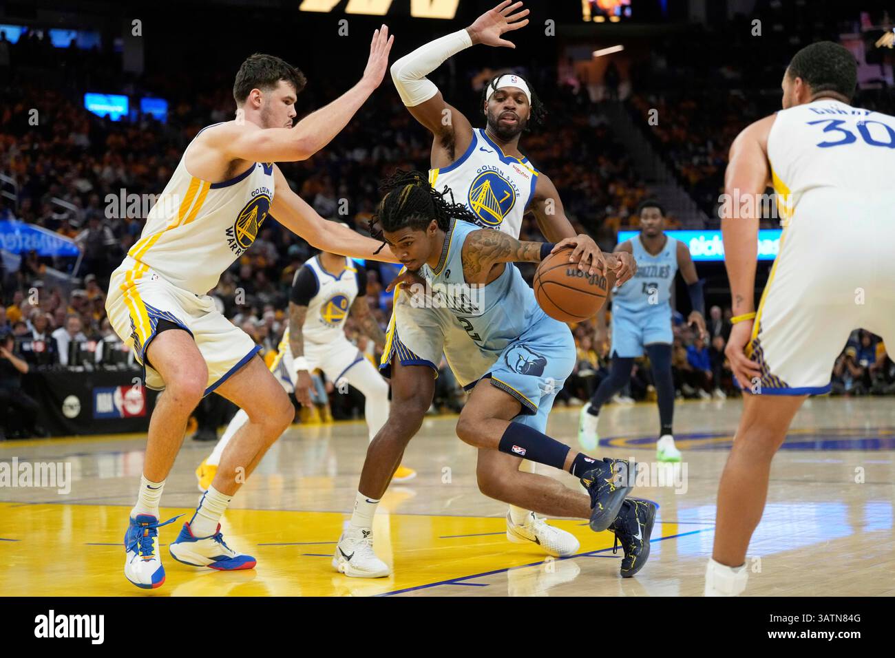 Memphis Grizzlies guard Ja Morant, bottom, drives to the basket against ...