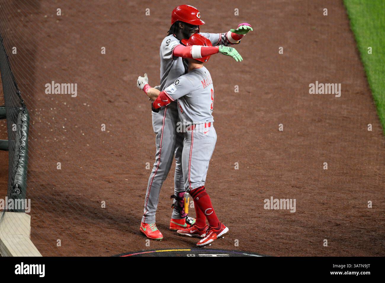 Cincinnati Reds' Matt McLain, right, celebrates his three-run home run ...