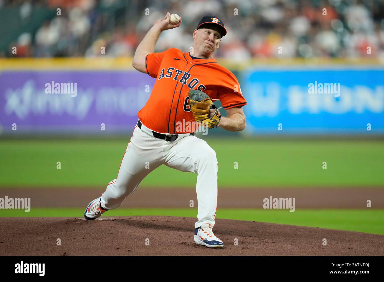 Houston Astros starting pitcher Ryan Gusto throws during the first ...