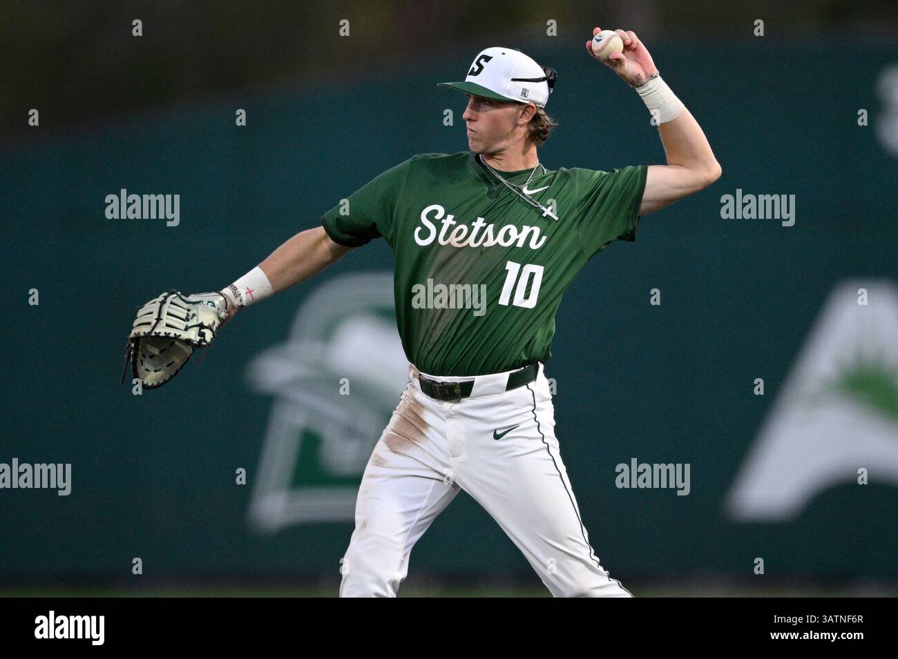 Stetson infielder Landon Moran (10) throws during an NCAA college ...