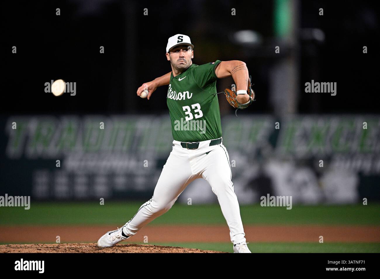 Stetson pitcher Justin Solimine (33) throws during an NCAA college ...