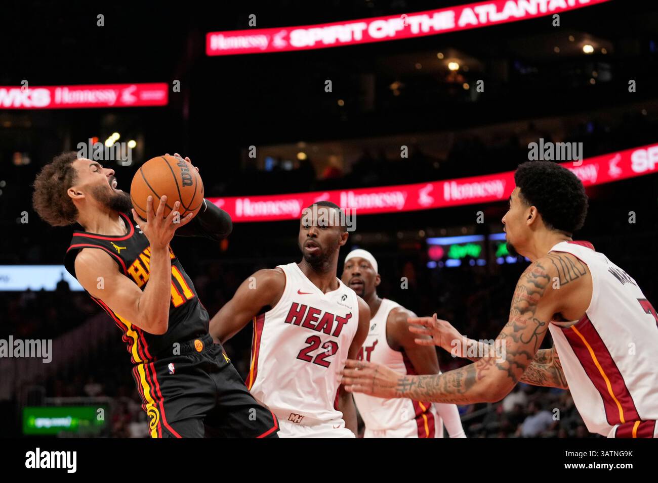 Atlanta Hawks guard Trae Young (11) is fouled by Miami Heat forward ...