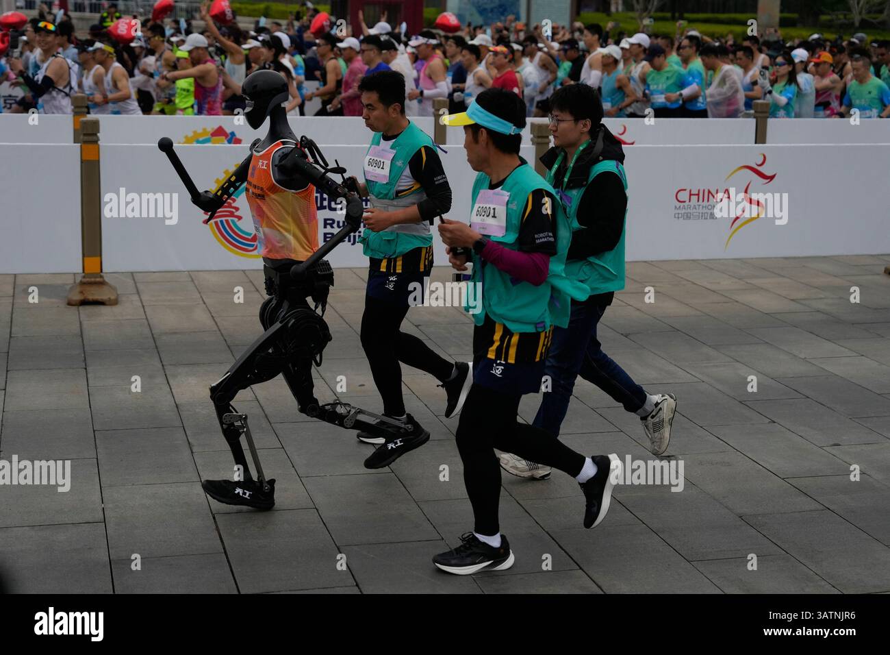 A robot takes part in what is billed as the world's first robot half ...