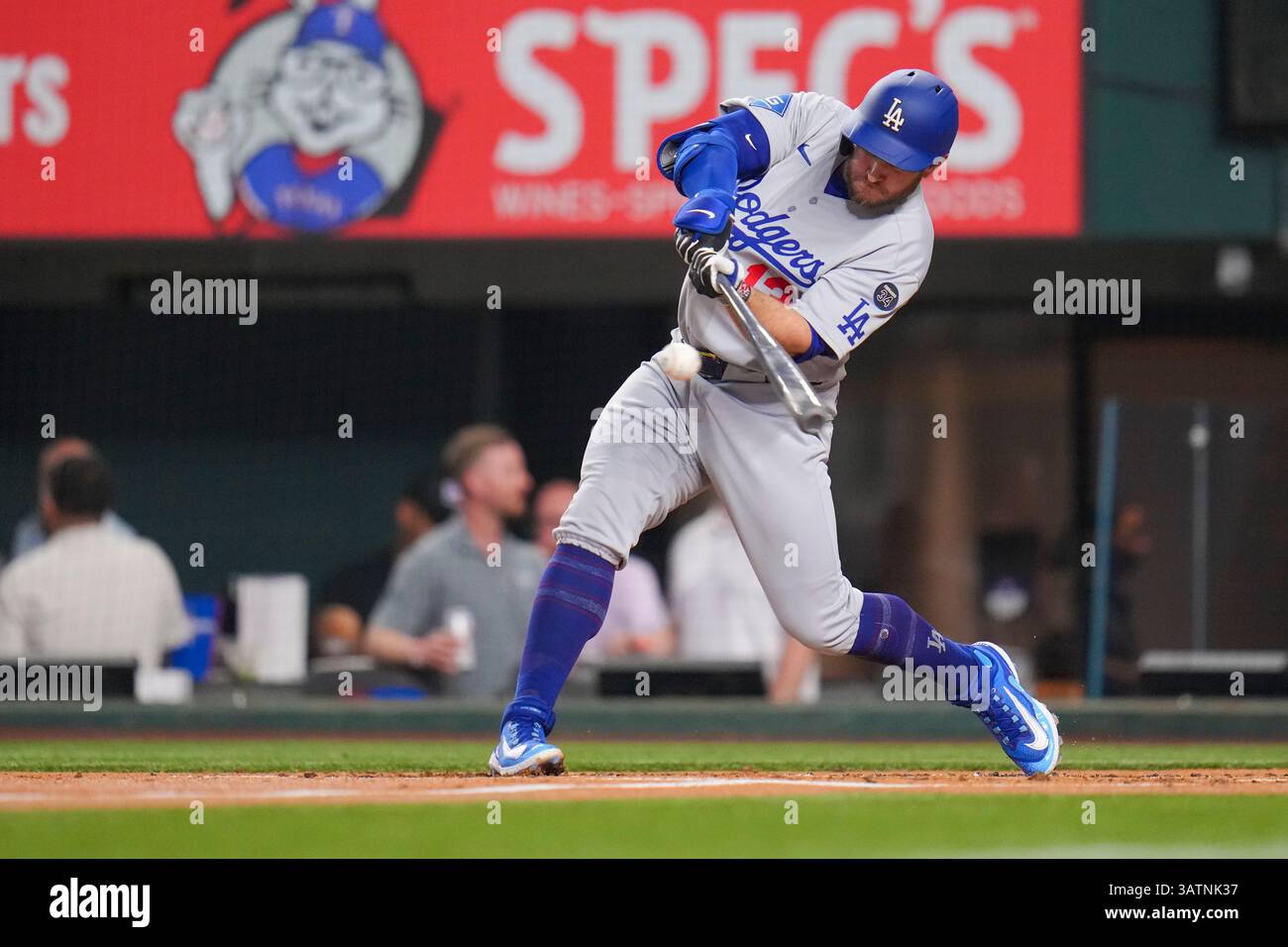 Los Angeles Dodgers' Max Muncy connects for a single against the Texas ...