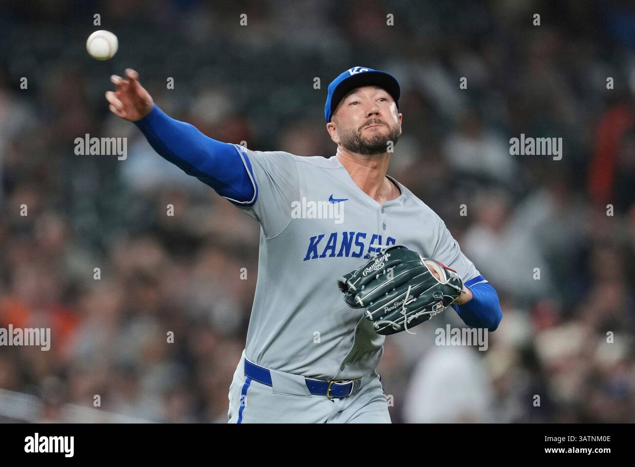 Kansas City Royals pitcher Lucas Erceg throws to first base for an out ...