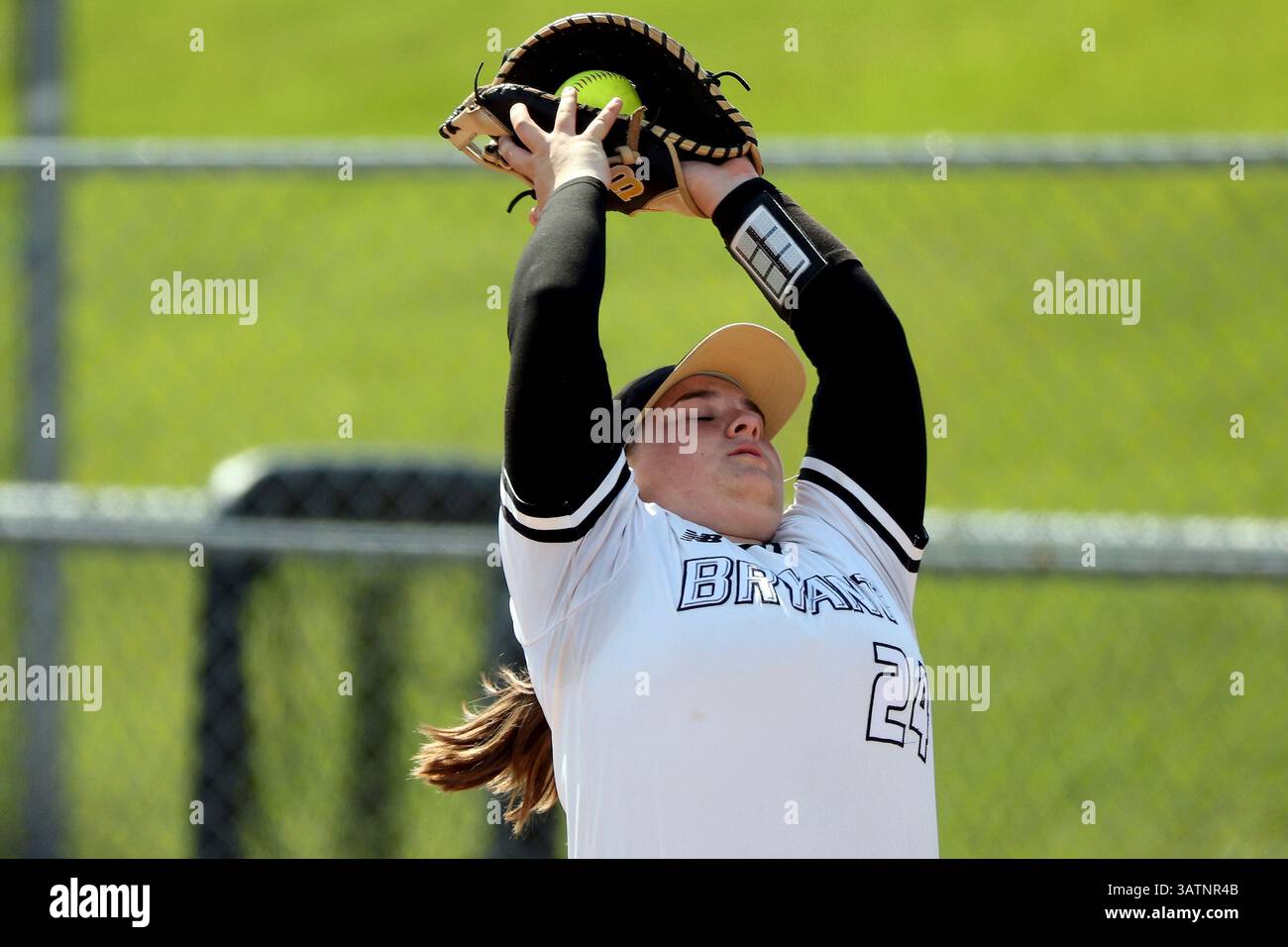 Bryant infielder Bryce Clendenin (24) makes a catch during an NCAA ...