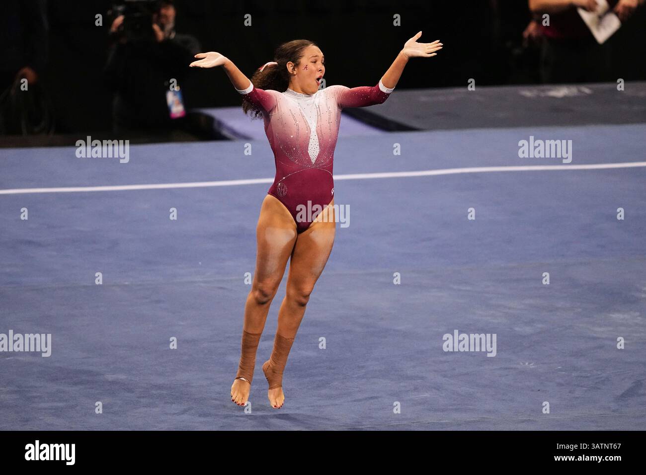 Alabaman's Paityn Walker celebrates after competing on the floor ...