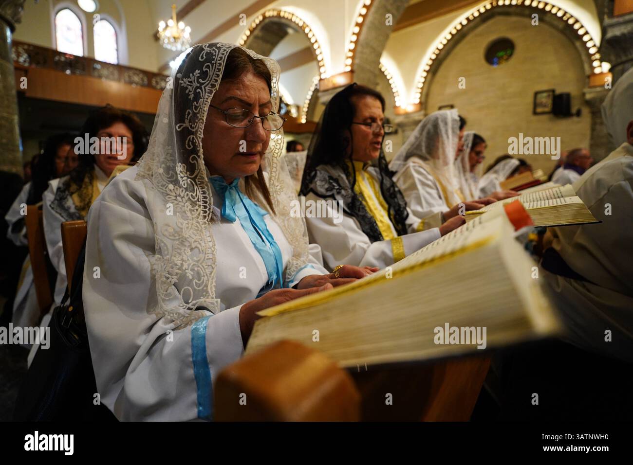 Alqosh, Iraq. 18th Apr, 2025. Christians attend the Good Friday ...