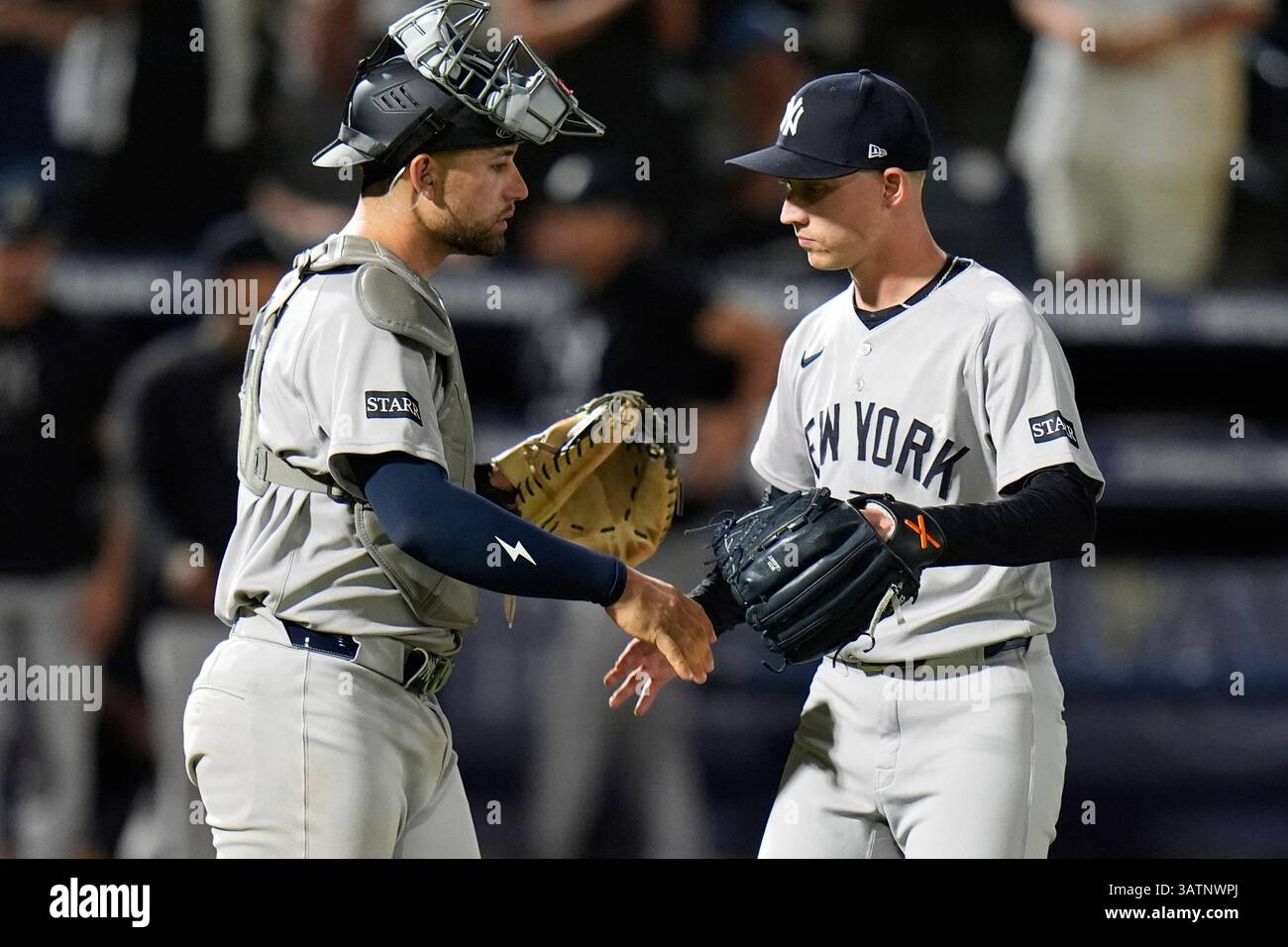 New York Yankees pitcher Luke Weaver, right, celebrates with catcher J ...