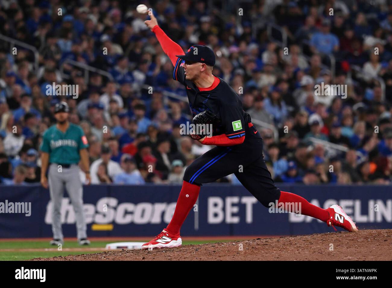 Toronto Blue Jays relief pitcher Chad Green throws to a Seattle ...
